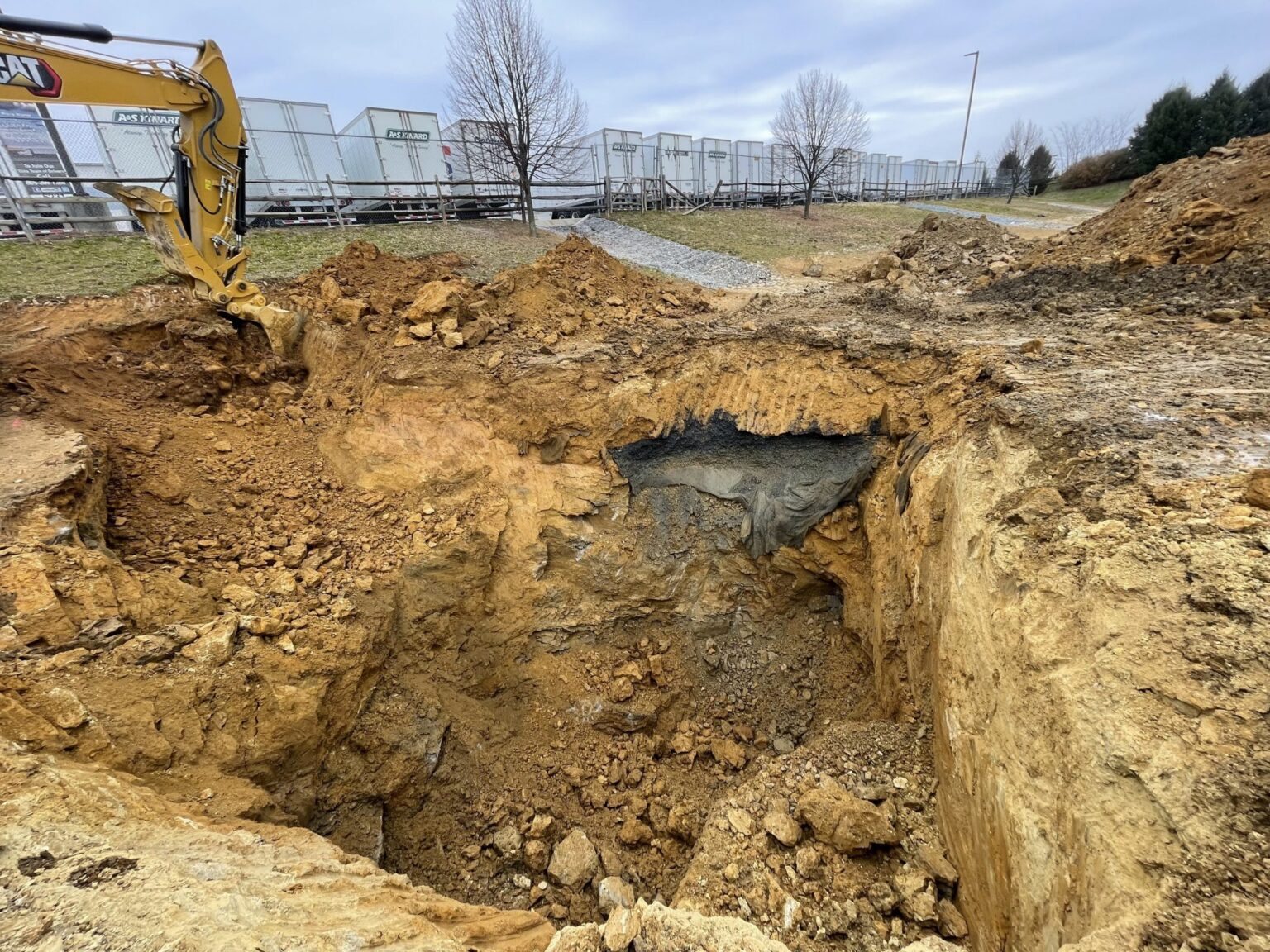 Pratt Industries Retention Basin Sinkhole Remediation - EMI Landscape